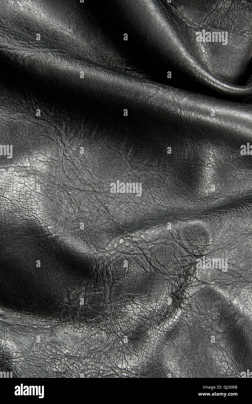 Crumpled black leather texture Stock Photo - Alamy