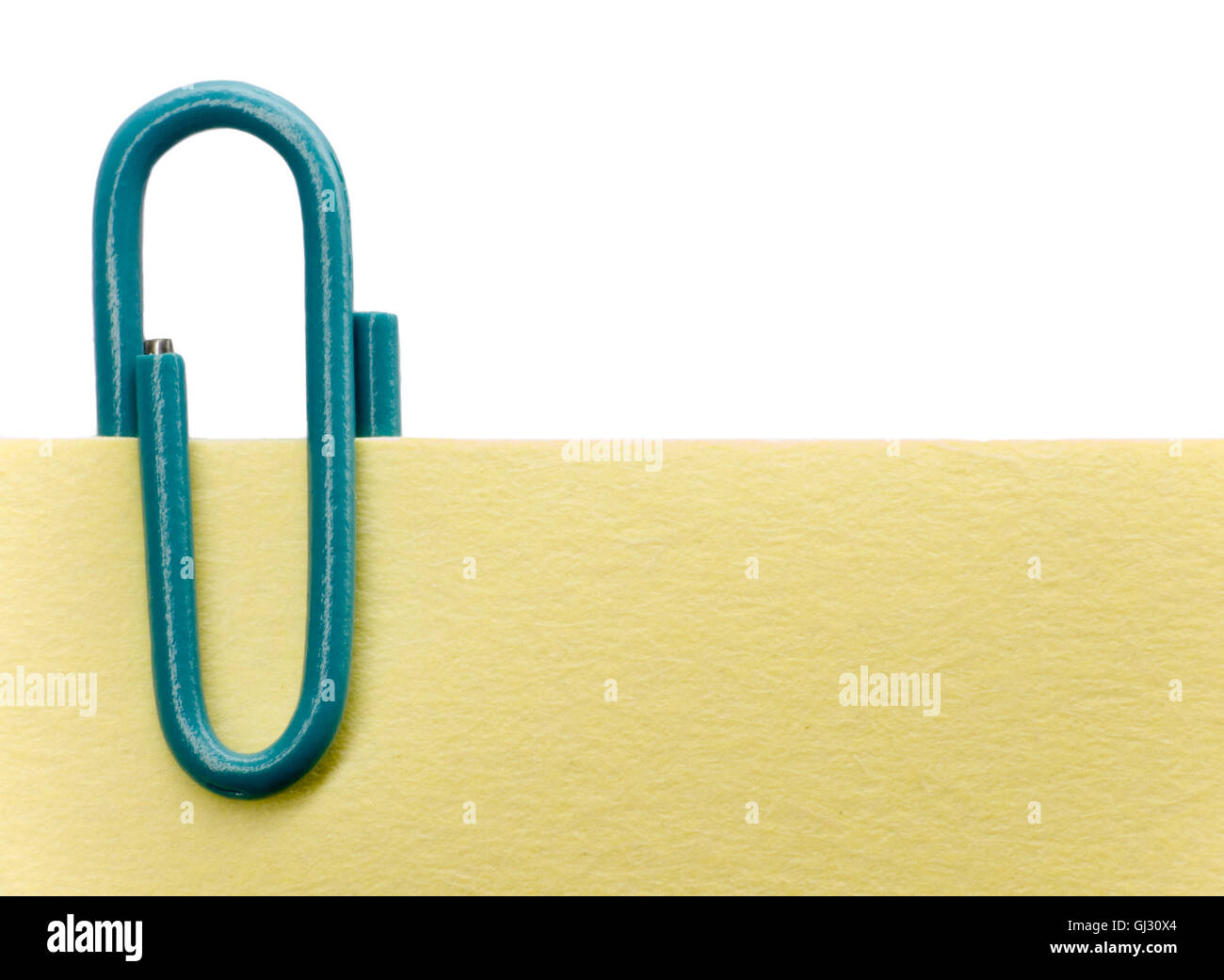 Paperclip on a note Stock Photo - Alamy