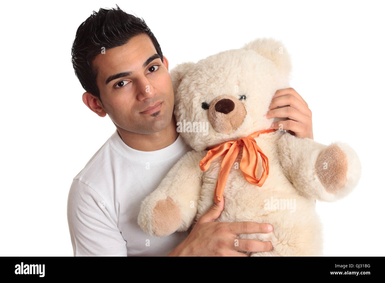 Affectionate man holding bear Stock Photo - Alamy