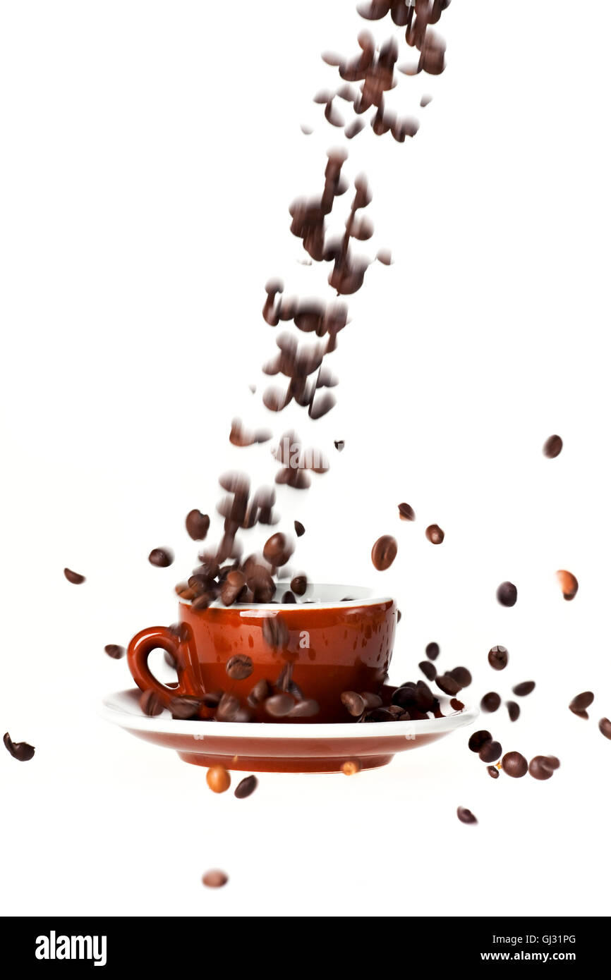 coffee bean splash isolated on white Stock Photo - Alamy