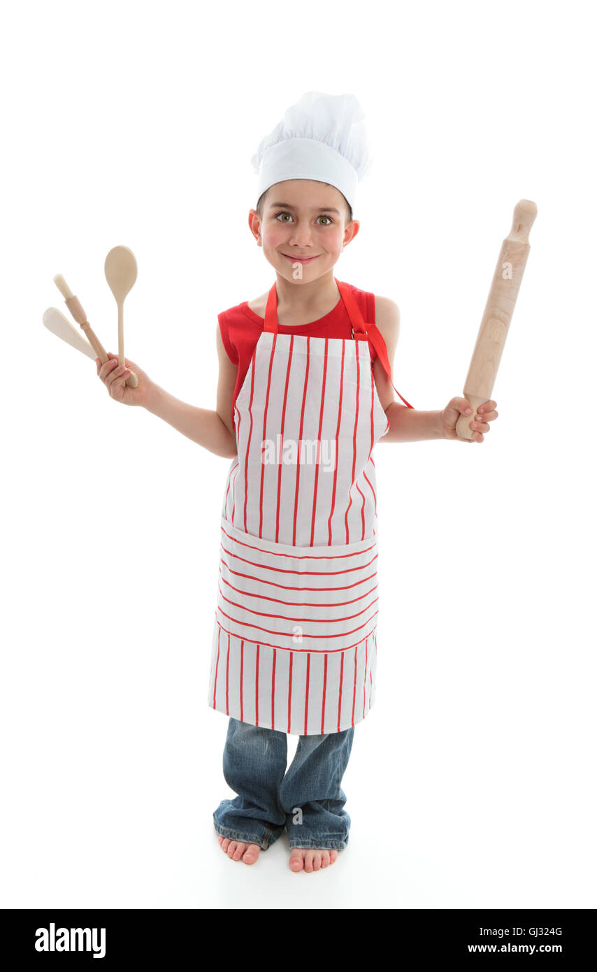 Little chef holding kitchen utensils Stock Photo - Alamy