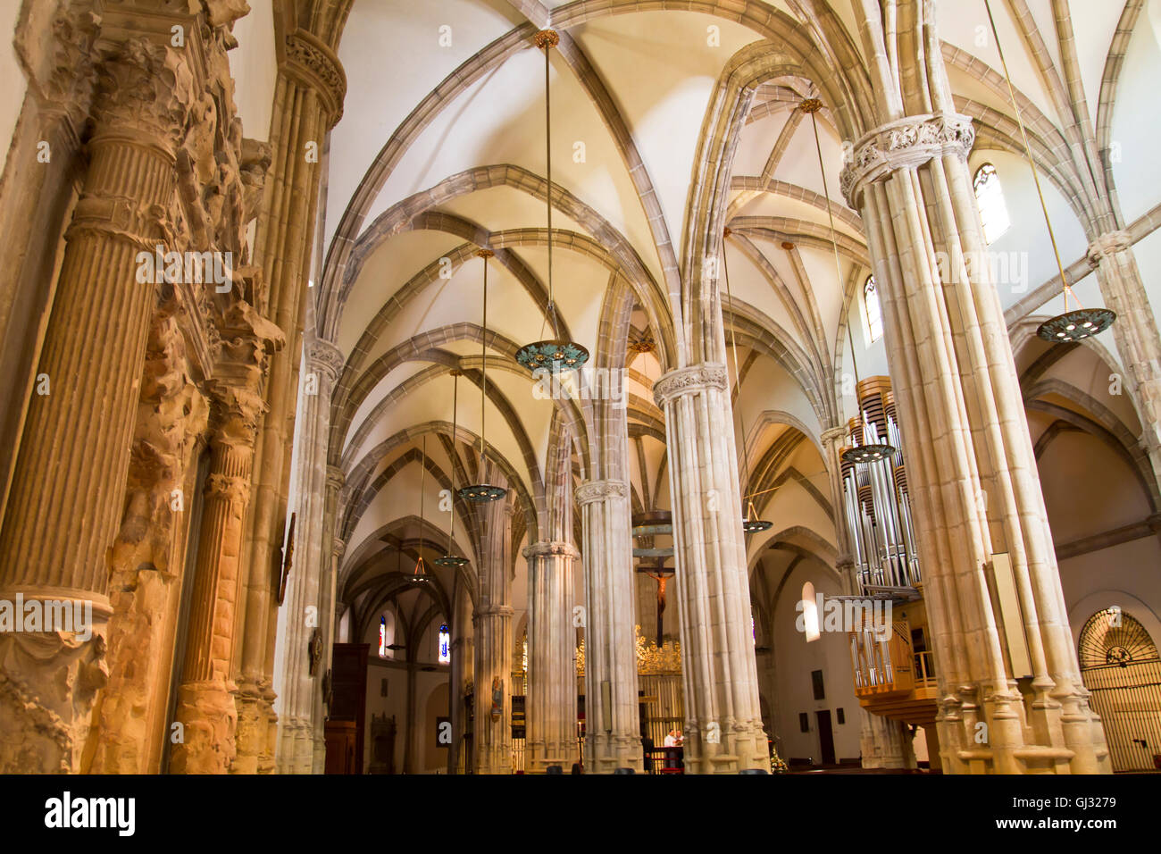 Cathedral nave, a space with Gothic-style columns Stock Photo - Alamy