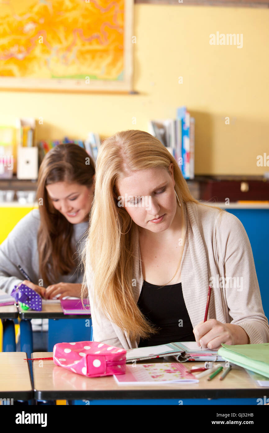 Two girls in the classroom Stock Photo - Alamy