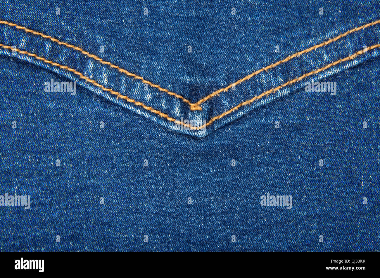 Blue denim texture with yellow stitch Stock Photo - Alamy