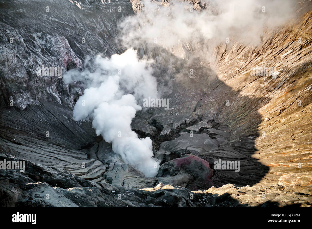 Smoking creater volcano Stock Photo - Alamy