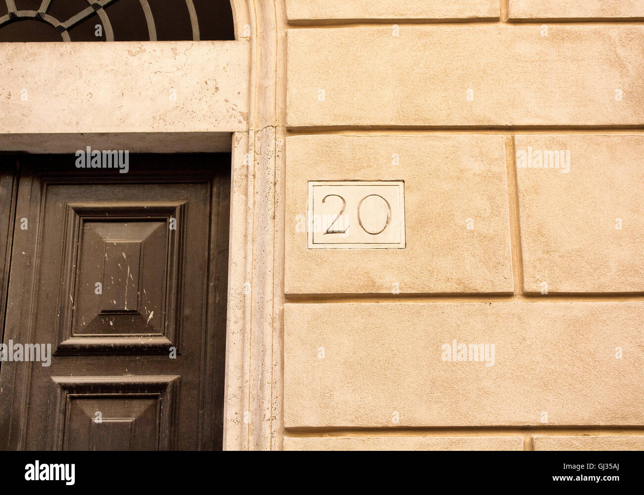 Engraved building number in Rome Stock Photo - Alamy