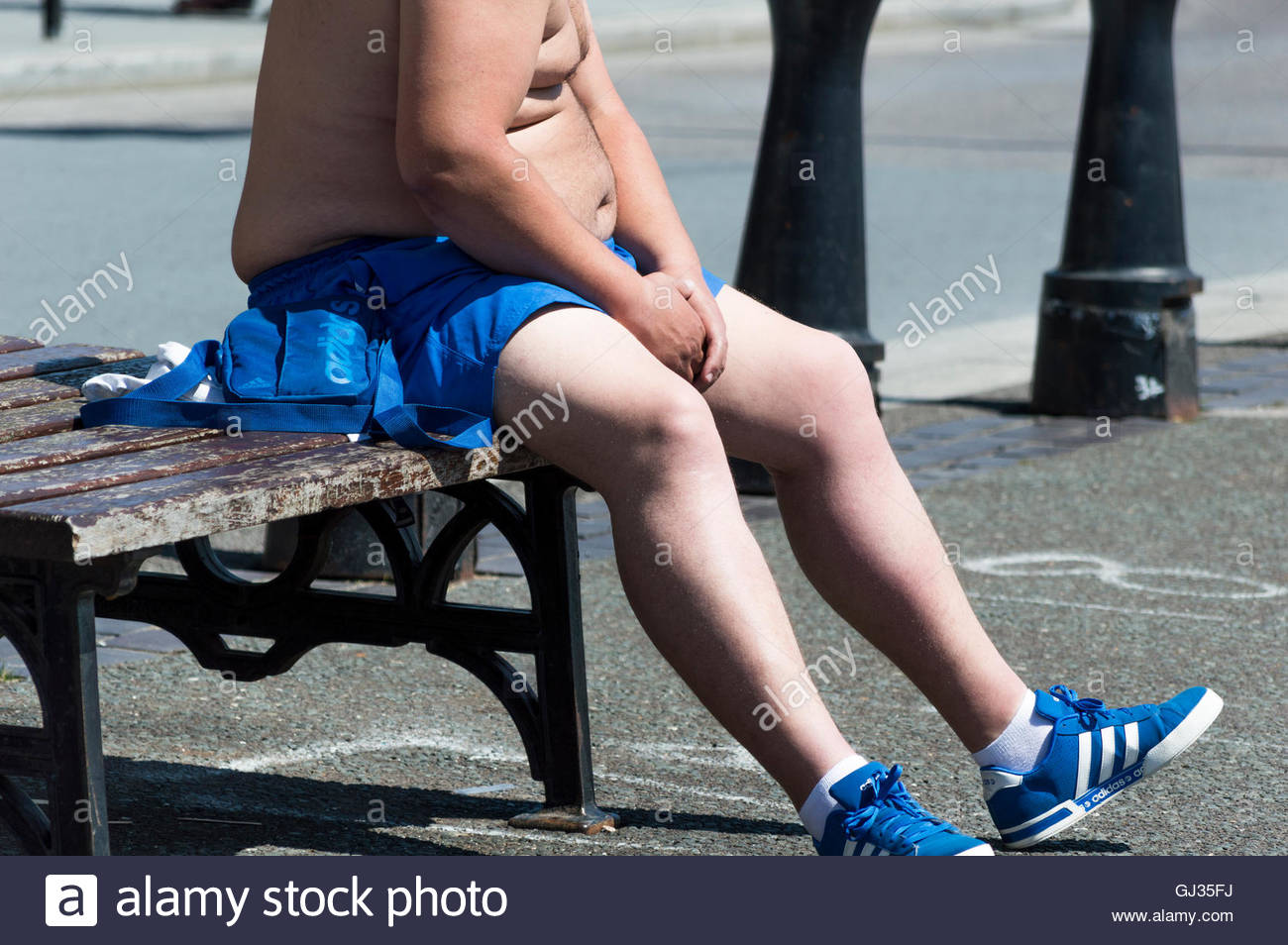 Heavy Man Sitting On Bench High Resolution Stock Photography and Images ...