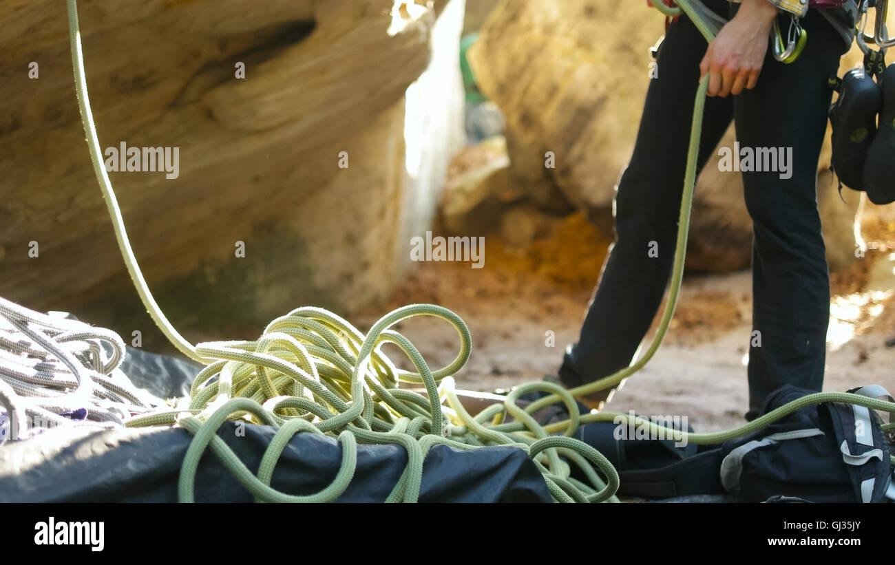Climbers at the Rock Mountain, partner securing the climber Stock Photo ...