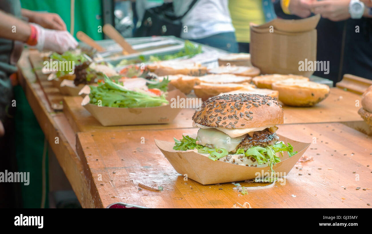 Finished burger on the table, higher angle Stock Photo - Alamy