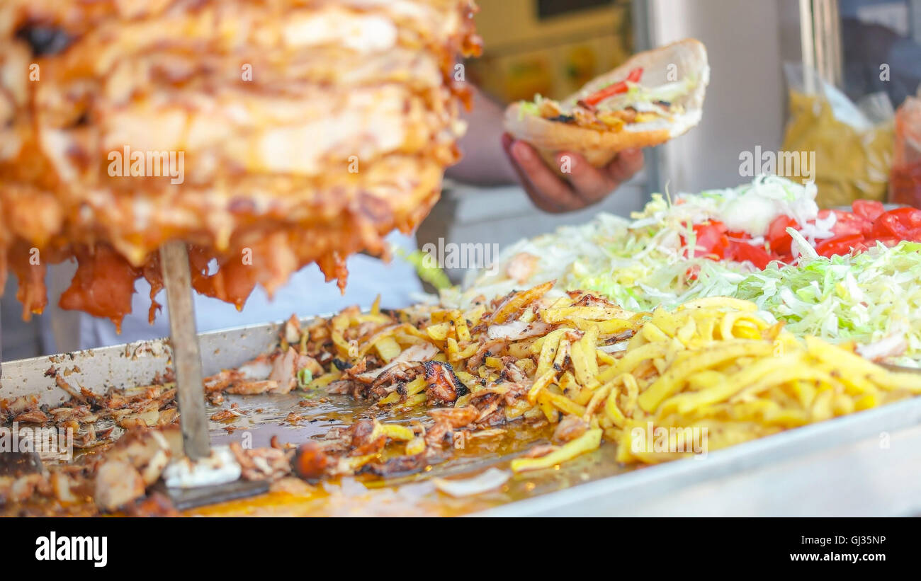 Fat man eating kebab hi-res stock photography and images - Alamy