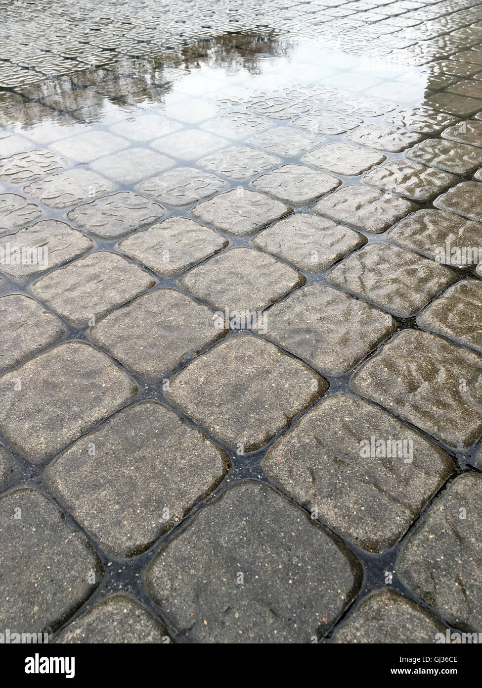 wet grey modern pavement background texture closeup Stock Photo - Alamy