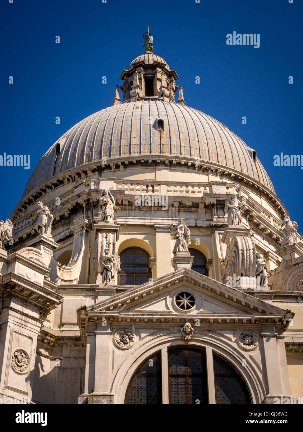 Exterior view of the entrance and dome of Santa Maria della Salute ...