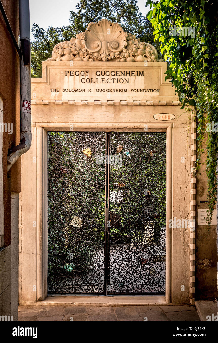 Contemporay metal and glass entrance gates of the Peggy Guggenheim ...