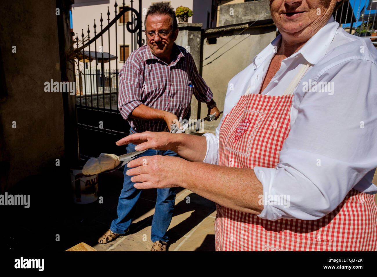 Italy, Bossico, bread-making Stock Photo - Alamy