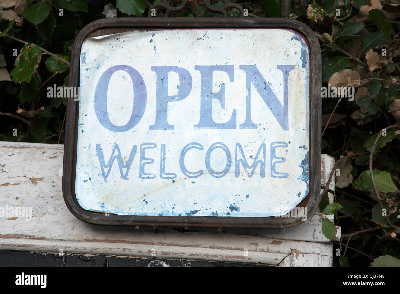 Old Open and Welcome Sign Stock Photo - Alamy