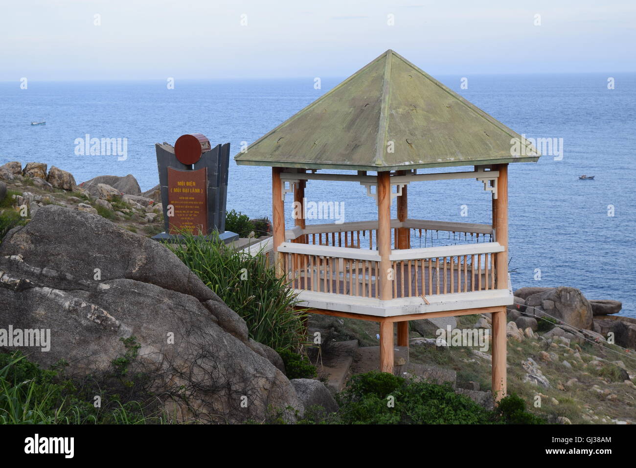 Pristine sea with watch tower at Dai Lanh cape point, Mui Dien, Phu Yen ...
