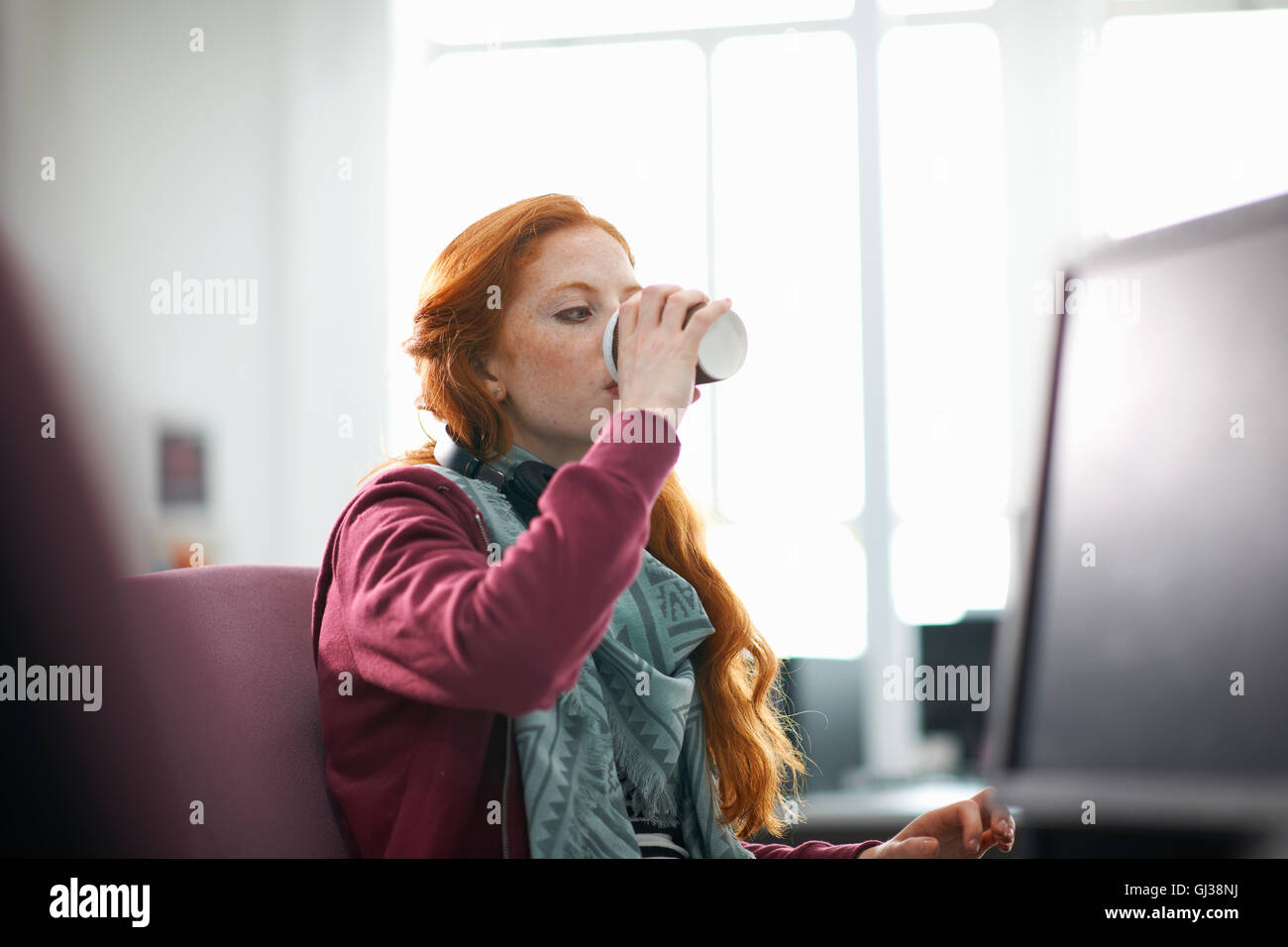 College student drinking coffee hi-res stock photography and images - Alamy