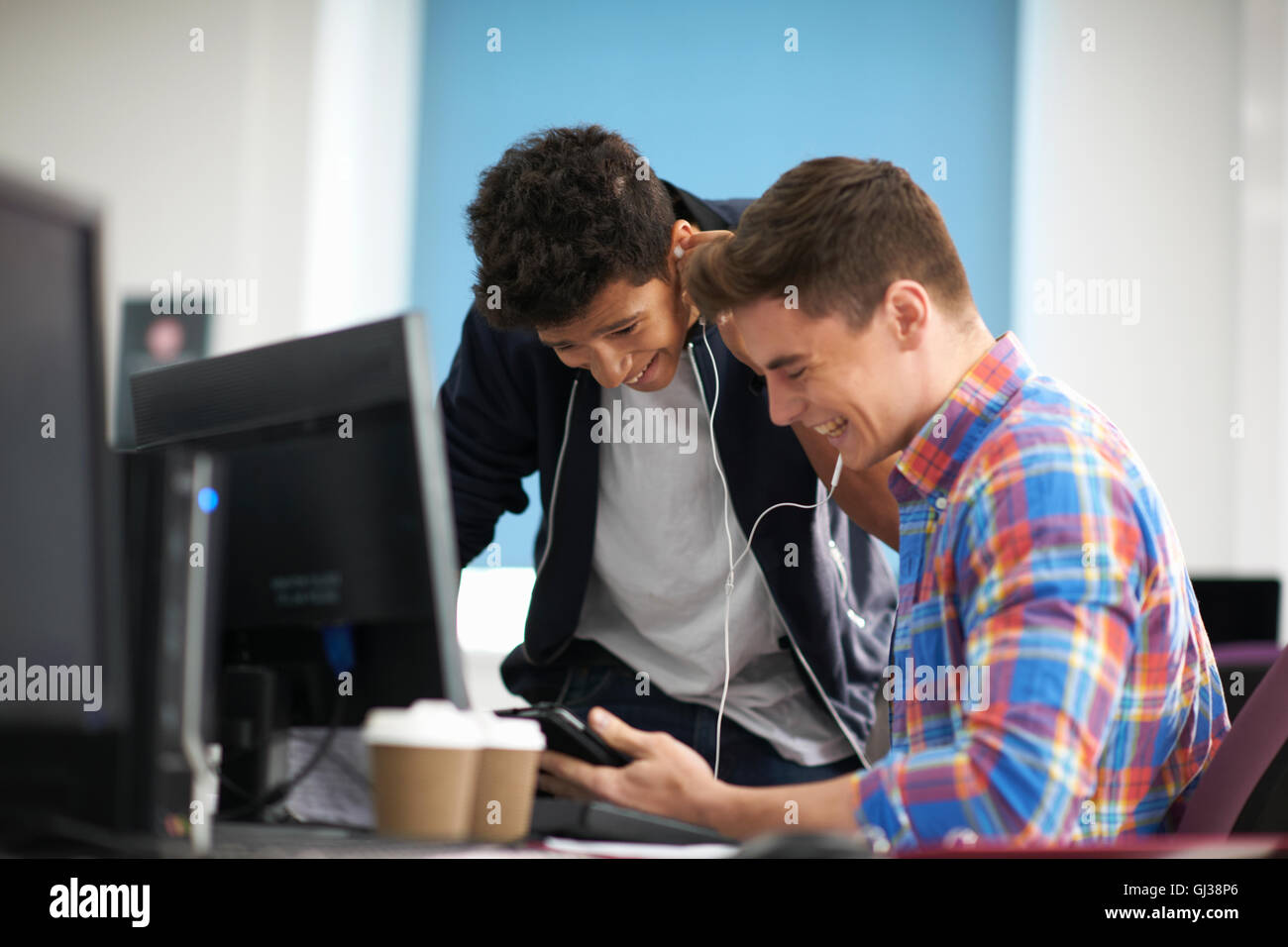 Male Student Laughing Computer High Resolution Stock Photography and ...