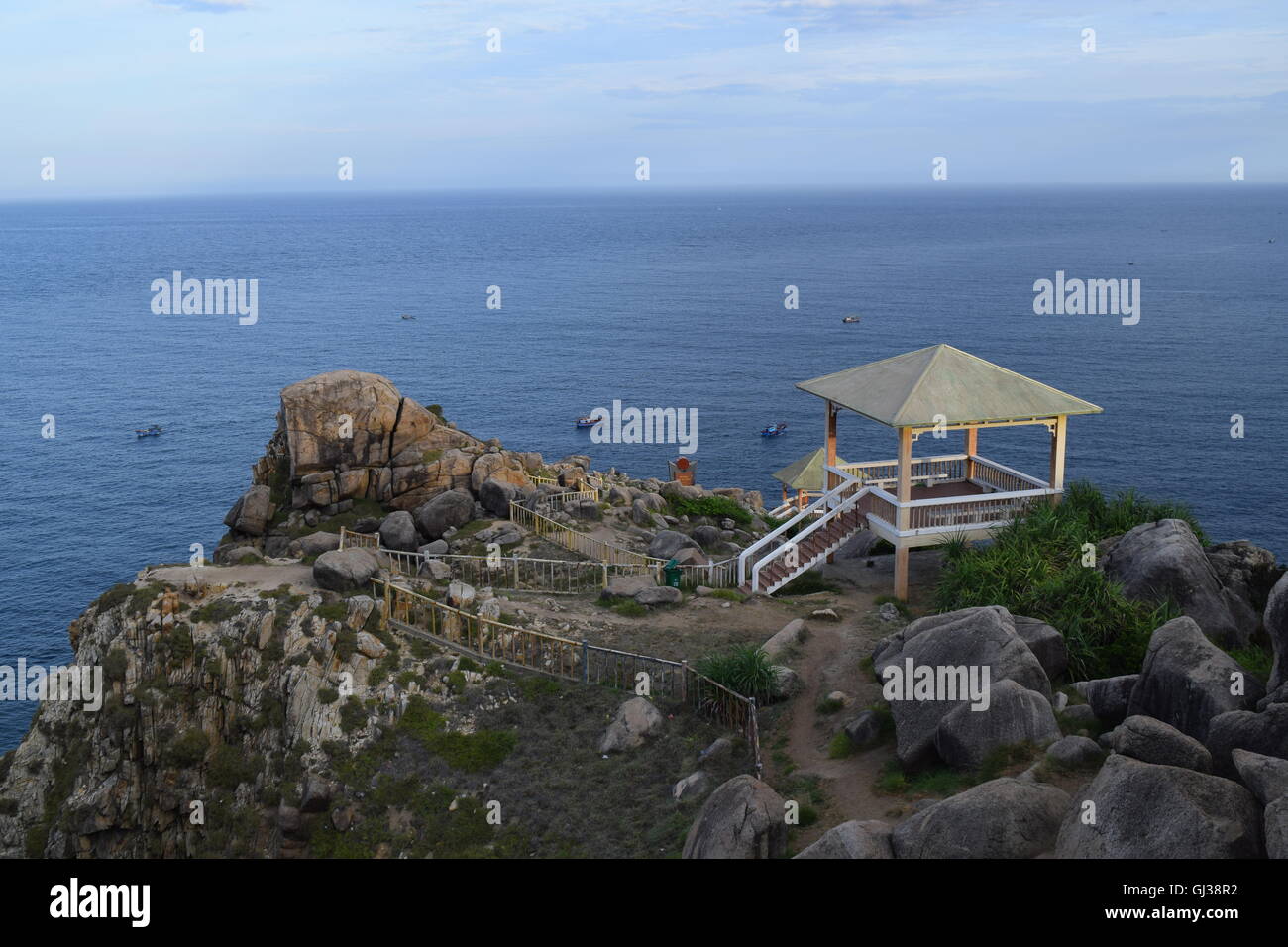 Pristine sea with watch tower at Dai Lanh cape point, Mui Dien, Phu Yen ...