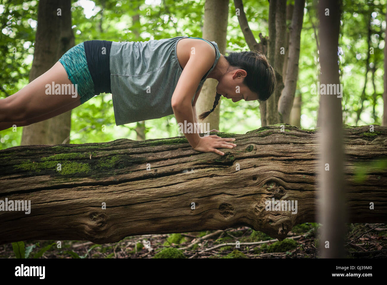 Asian female doing push ups hi-res stock photography and images - Alamy