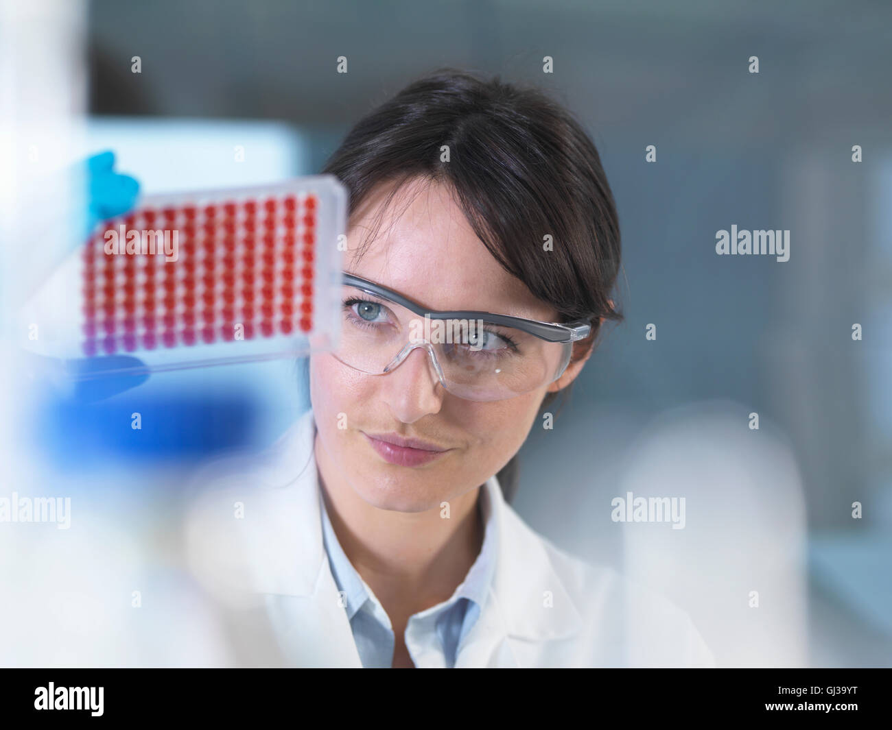 Scientist preparing blood samples for clinical testing in laboratory ... Scientist preparing blood samples for clinical testing in laboratory ...
