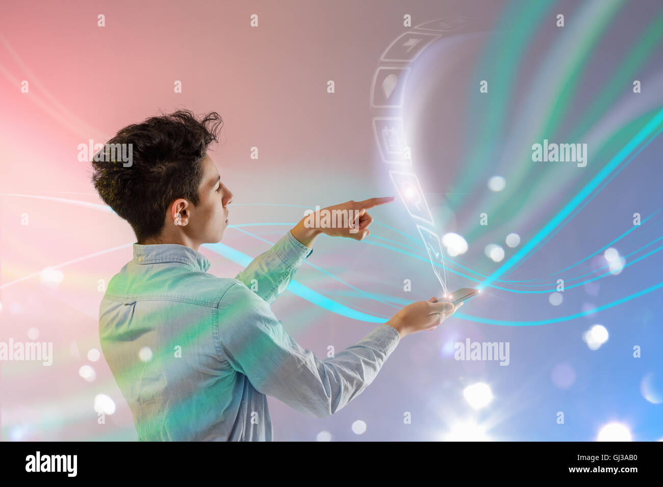 Young man using transparent touch screen Stock Photo - Alamy