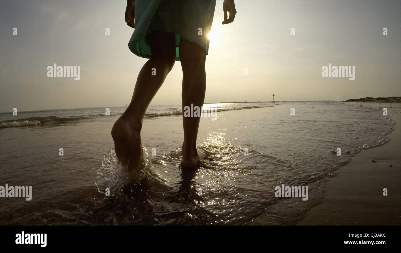 Legs walking in water beach hi-res stock photography and images - Alamy