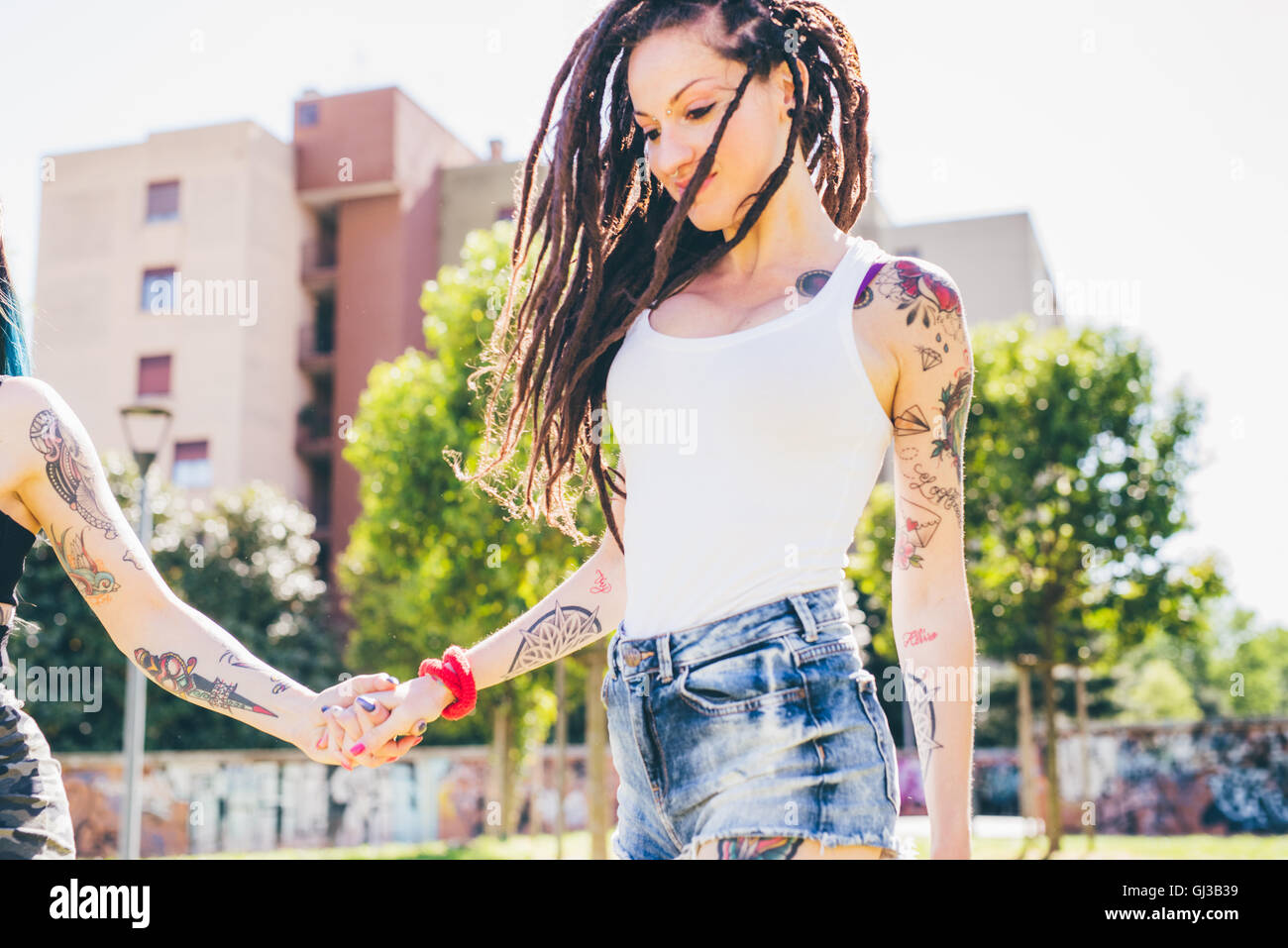 Two women wearing denim hi-res stock photography and images - Alamy