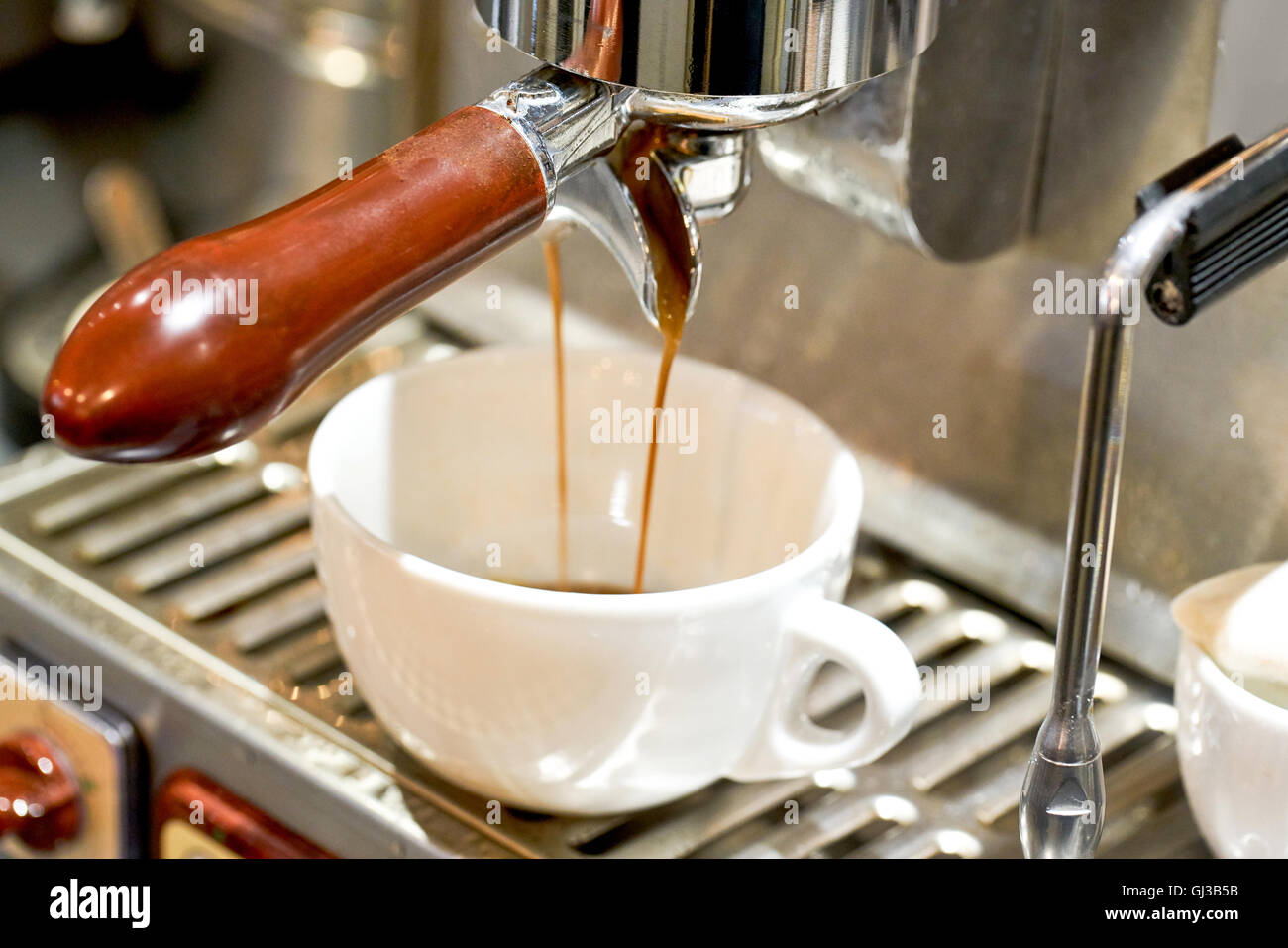 Pouring in coffee hi-res stock photography and images - Alamy