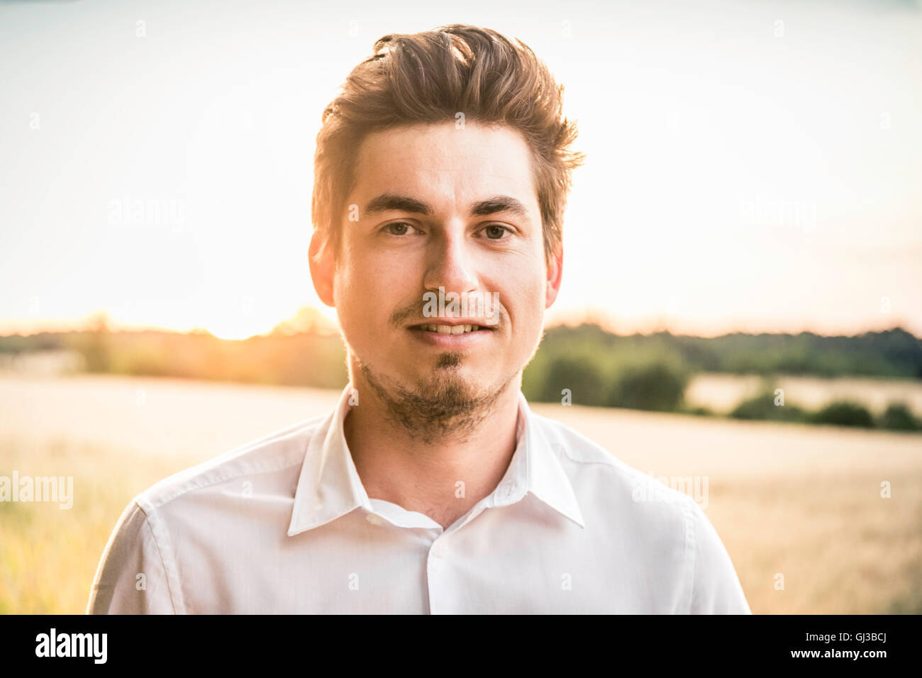 Portrait of smart young man Stock Photo - Alamy