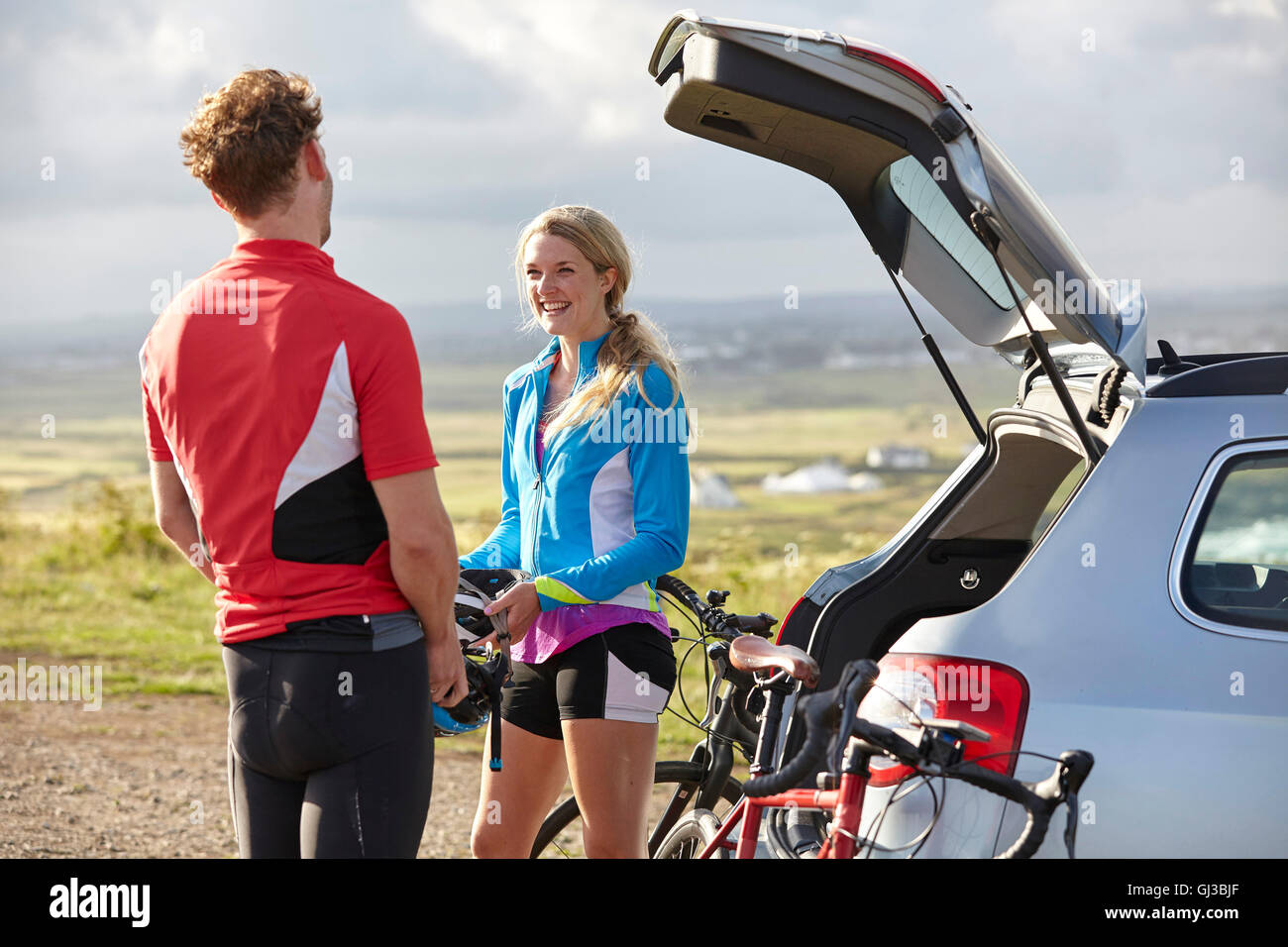 Car cyclist talking hi-res stock photography and images - Alamy