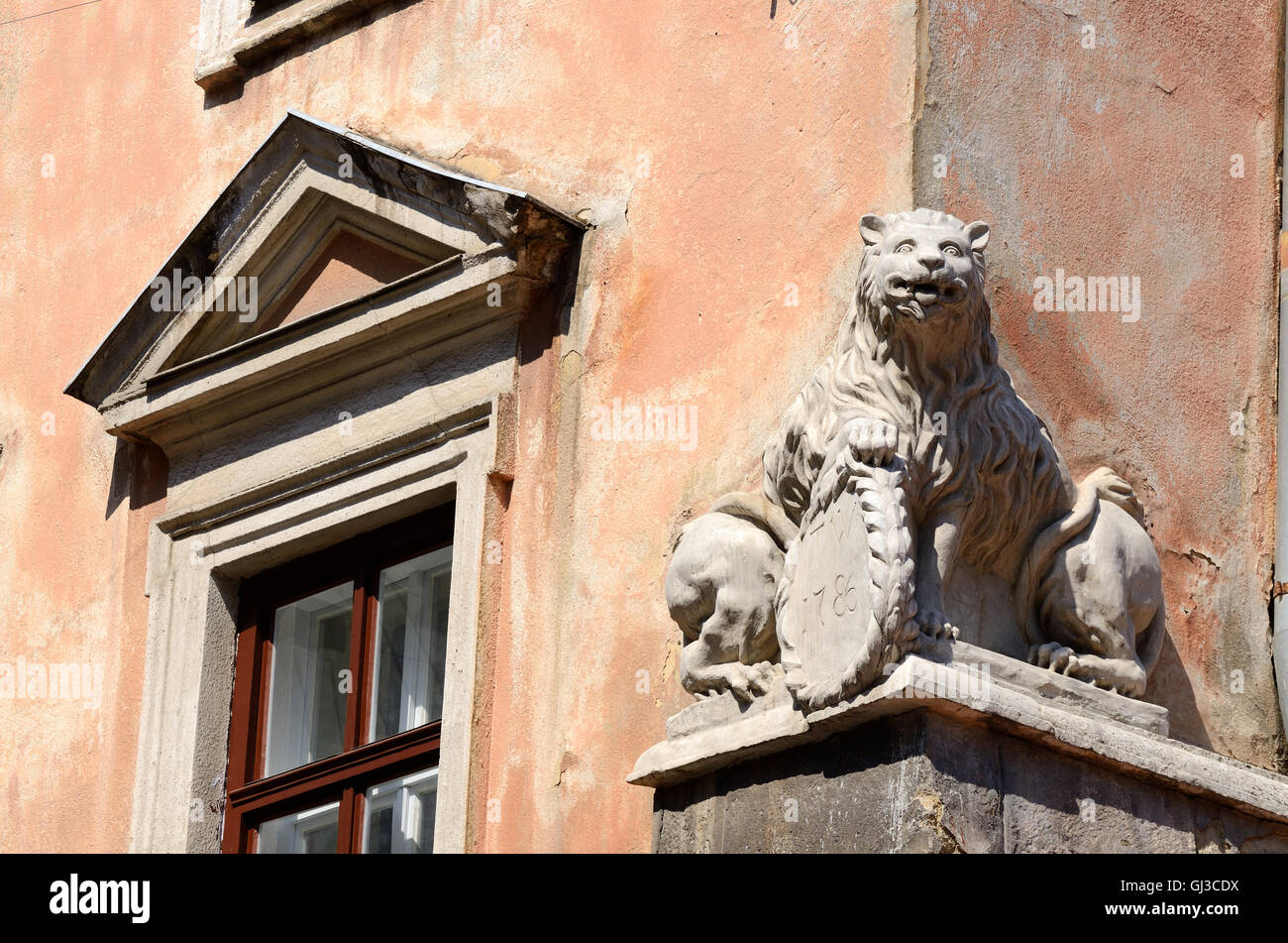 A beautiful Renaissance lion statue on medieval house facade in Lvov ...