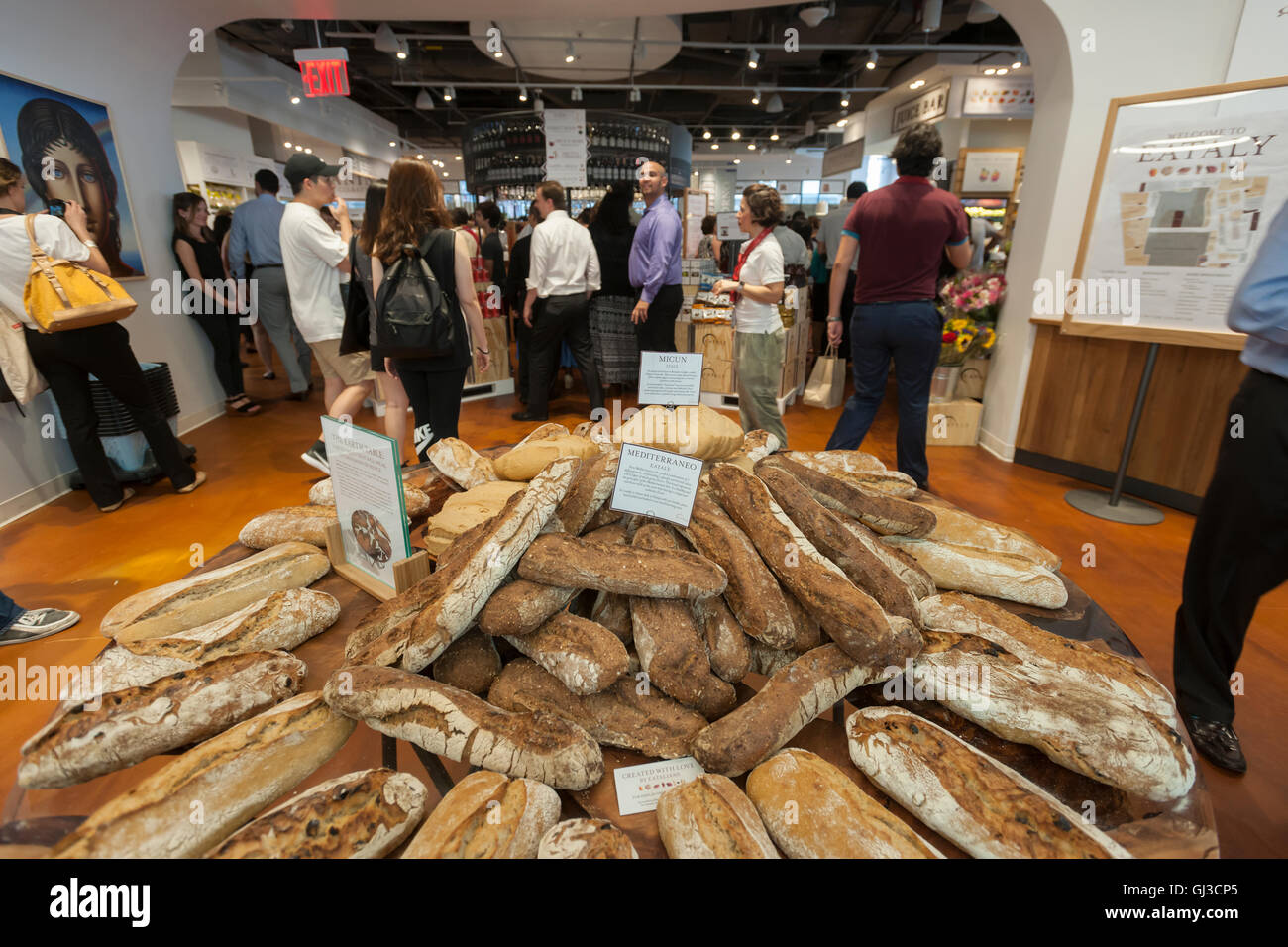 International loaves of bread greet shoppers at the grand opening of ...