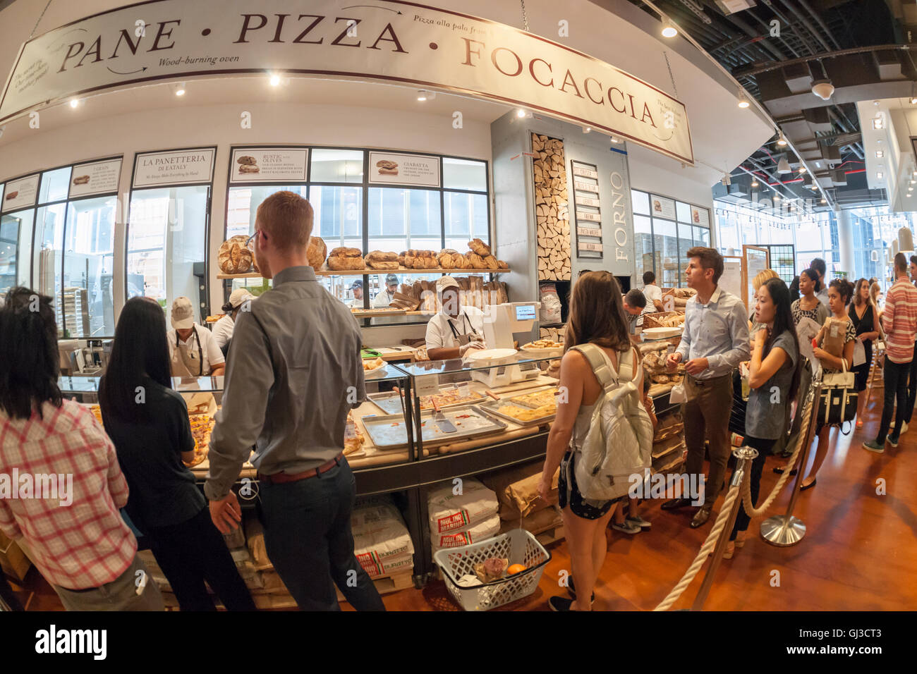 Line for focaccia and bread at the grand opening of Eataly Downtown in ...