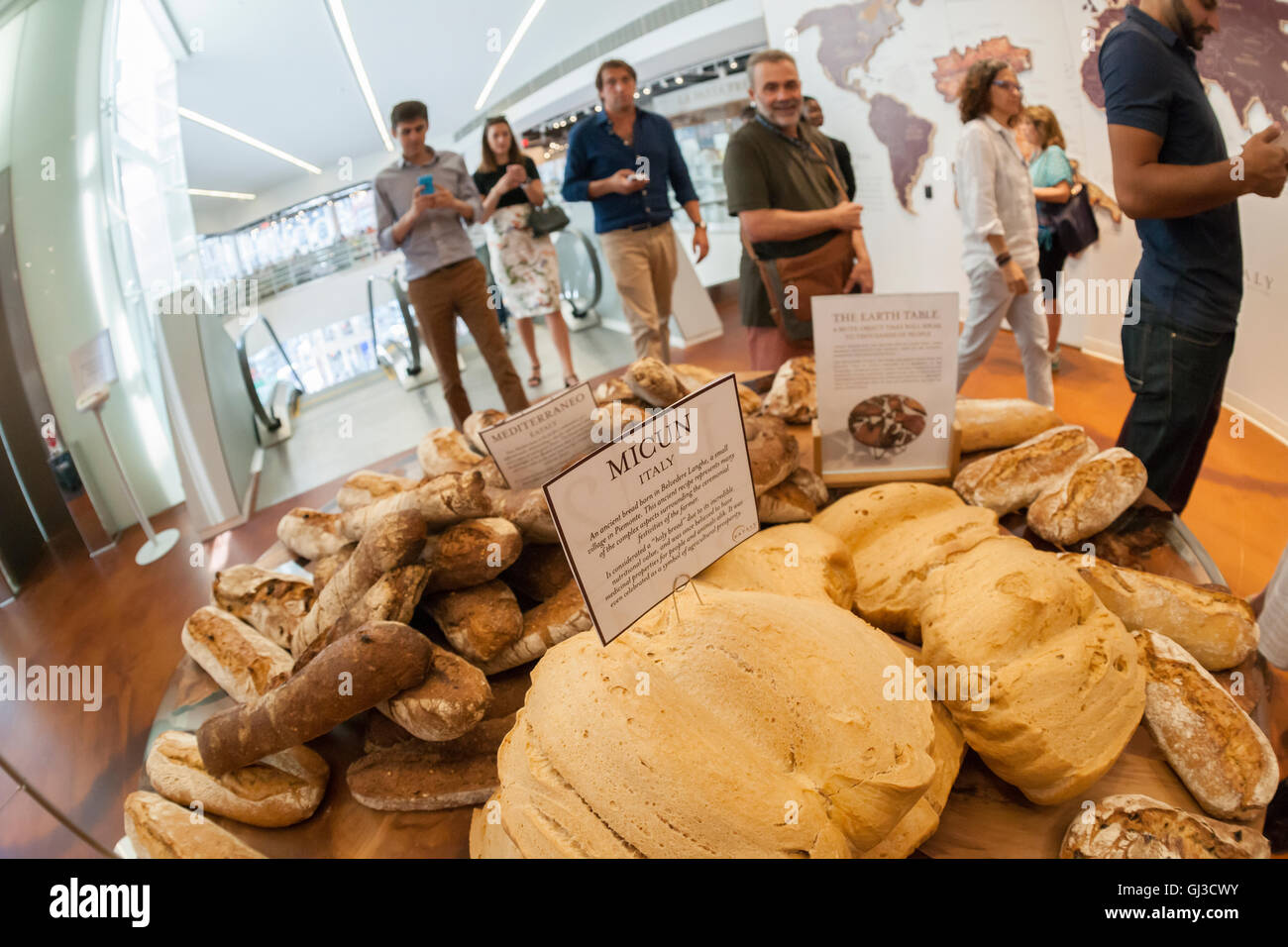International loaves of bread greet shoppers at the grand opening of ...