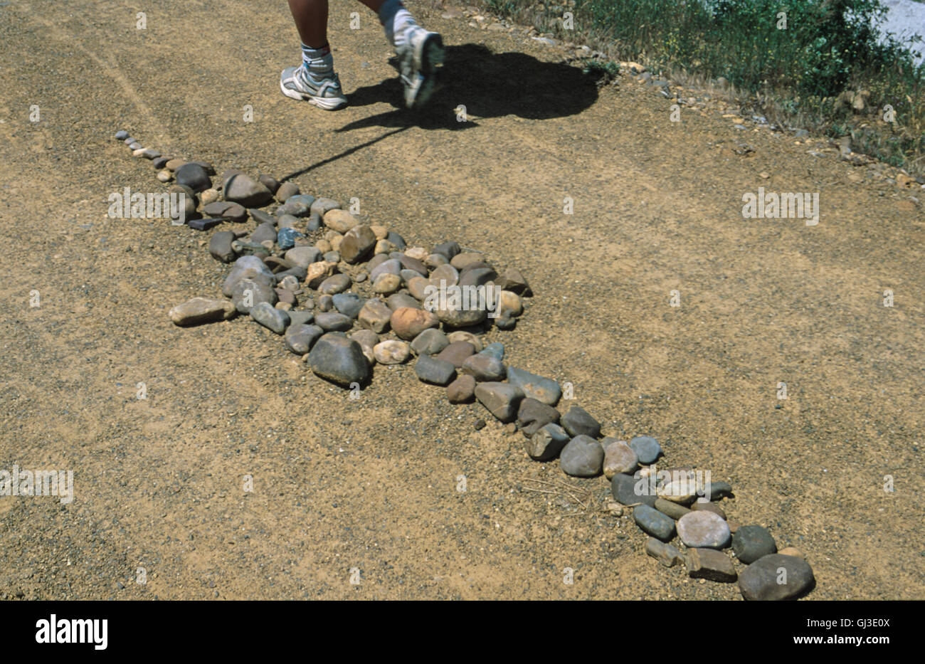 Pilgrim passing stones placed by pilgrims in the shape of an arrow to ...