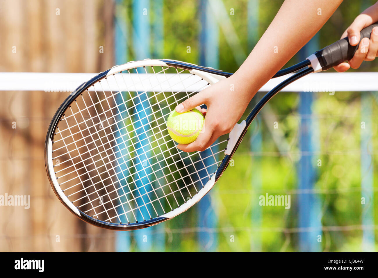Close-up picture of tennis player's hand with ball Stock Photo - Alamy