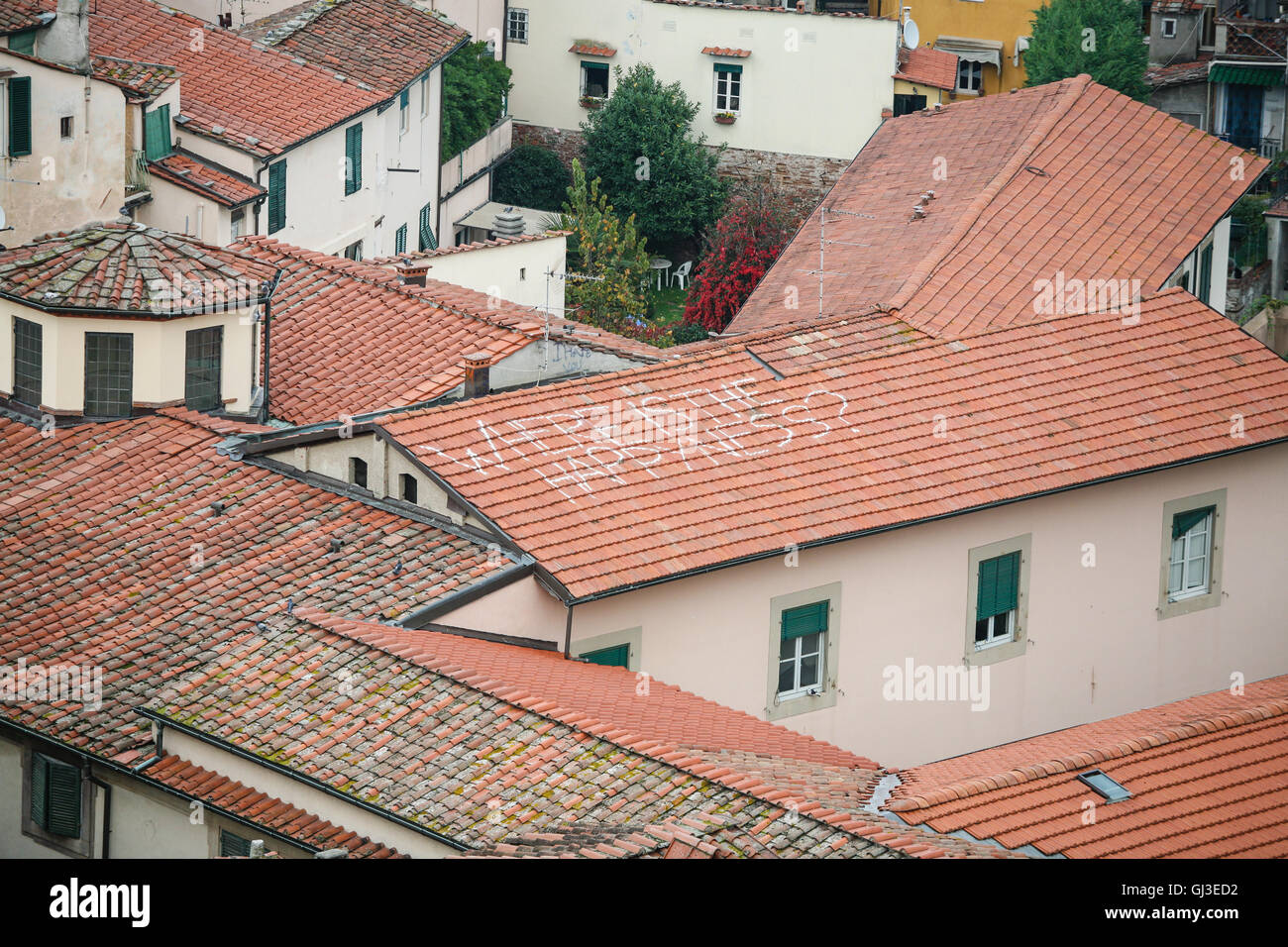 An expression of anxiety/depression or what. On the rooftop in ...