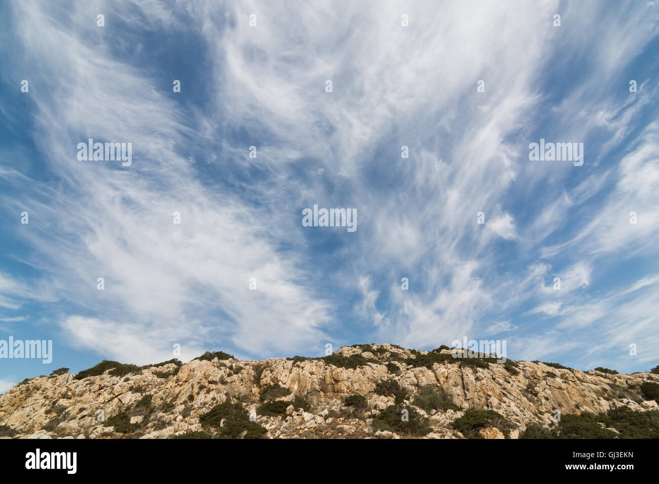 Cloudy sky above typical Cyprus landscape, Ayia Napa region Stock Photo ...