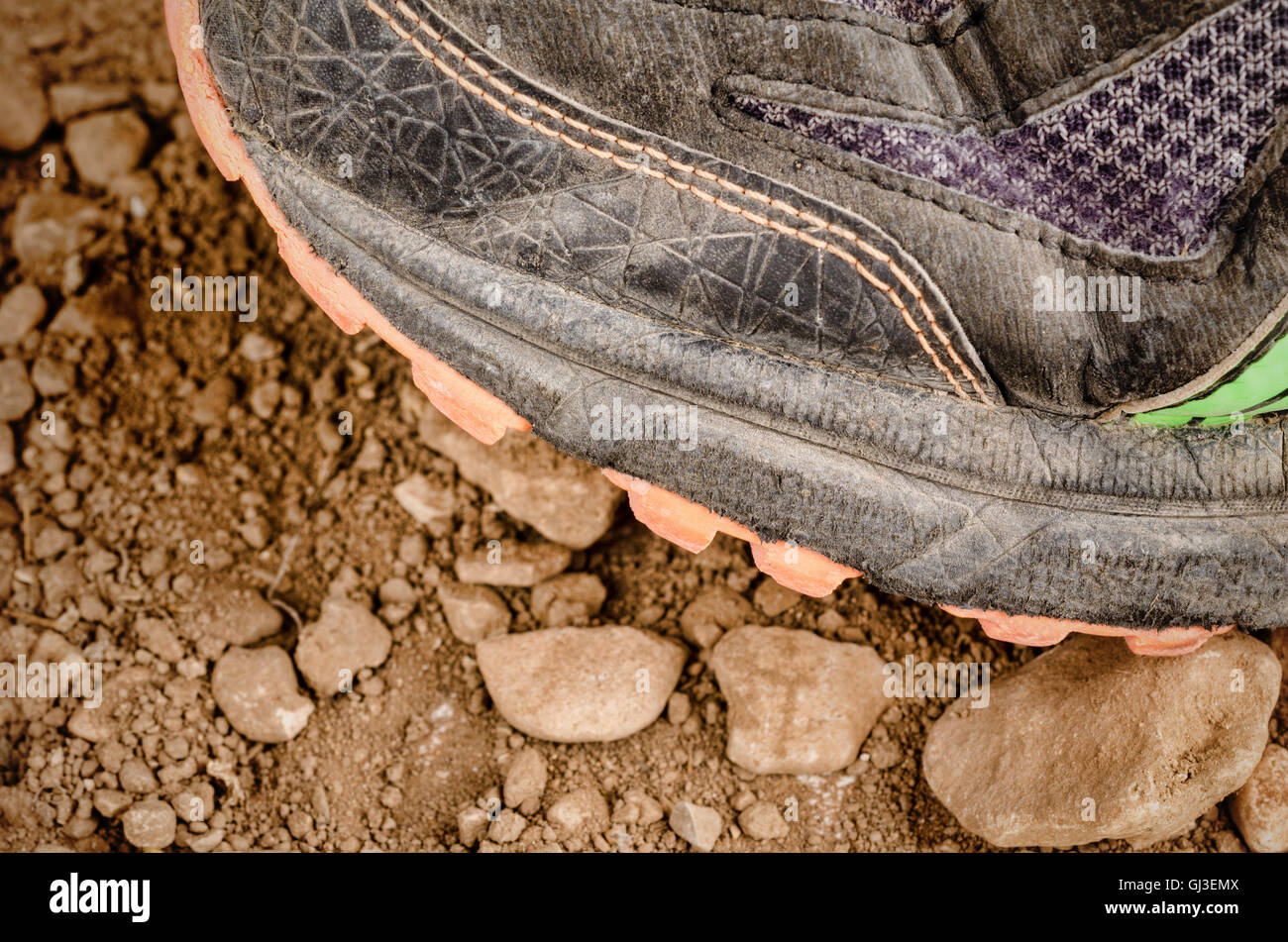 Trainers on rough unpaved ground during cross country running Stock ...