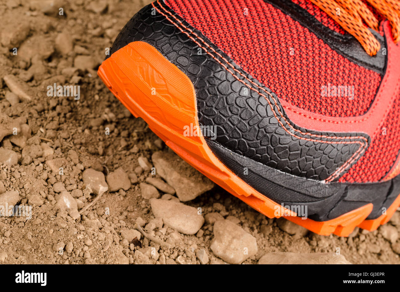 Trainers on rough unpaved ground during cross country running Stock ...