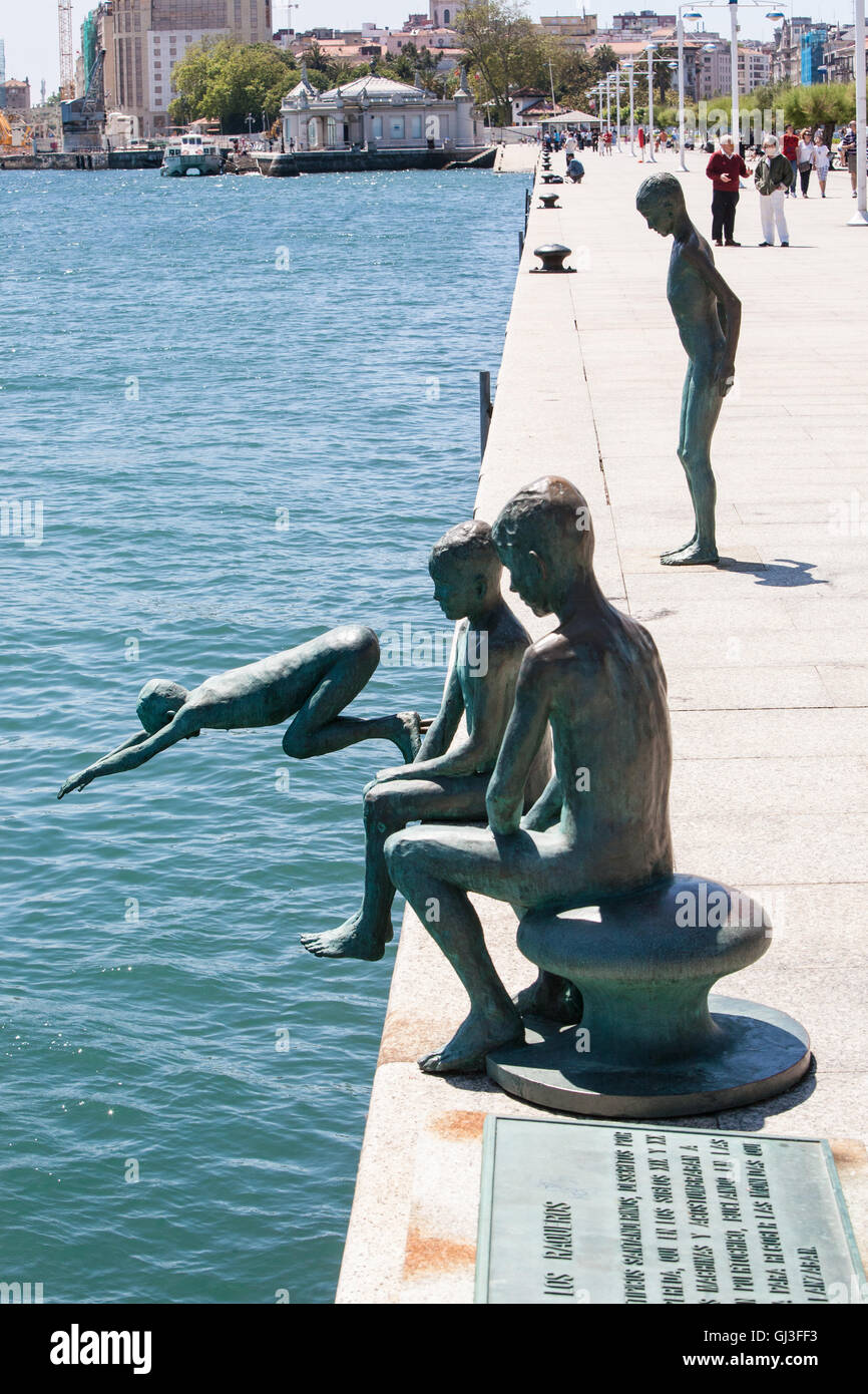 Los Raqueros sculpture at the promenade of Santander,photographing ...