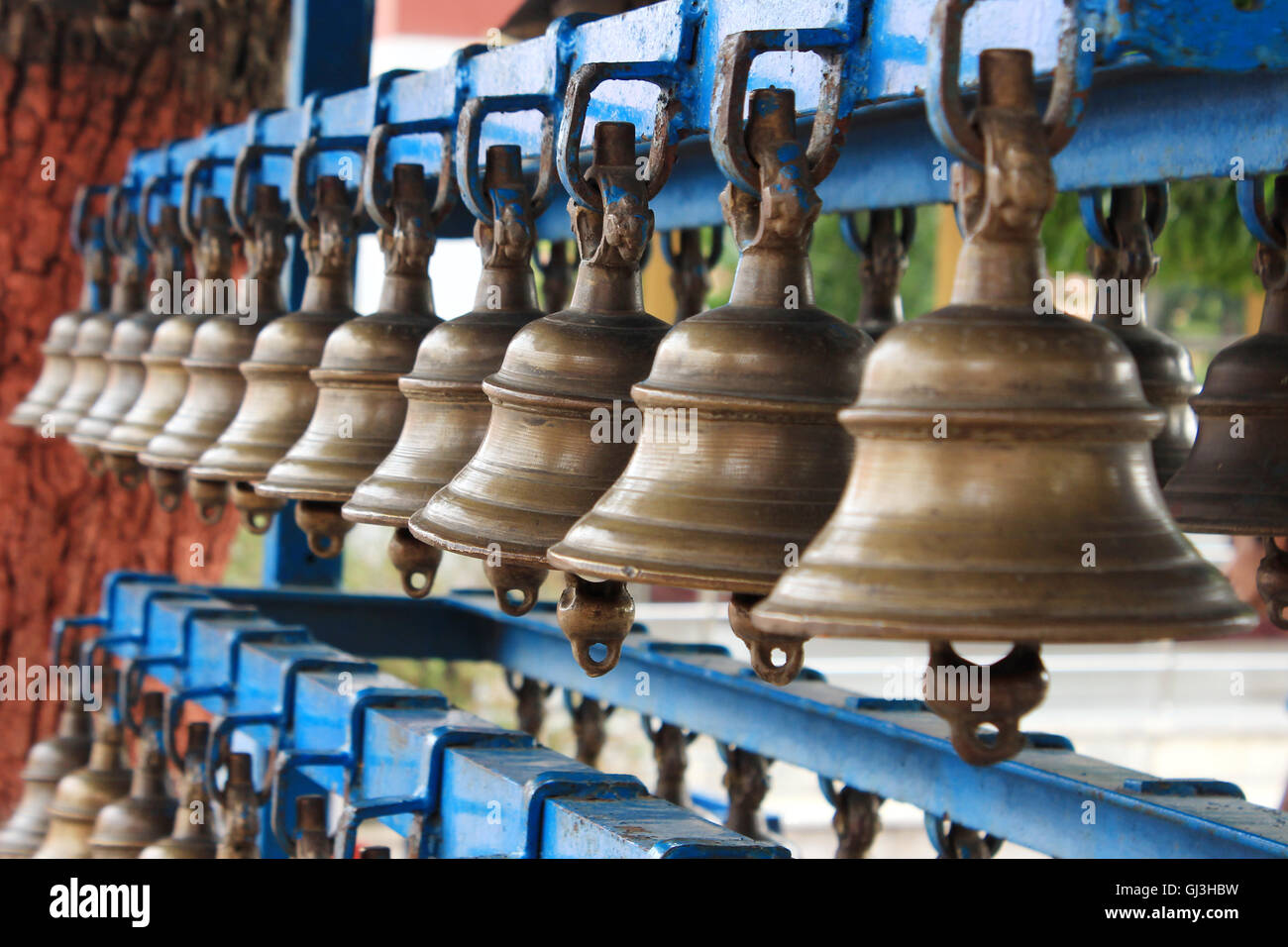 Hindu temple bells. Bells of the old temple in India. Pattern of bells ...
