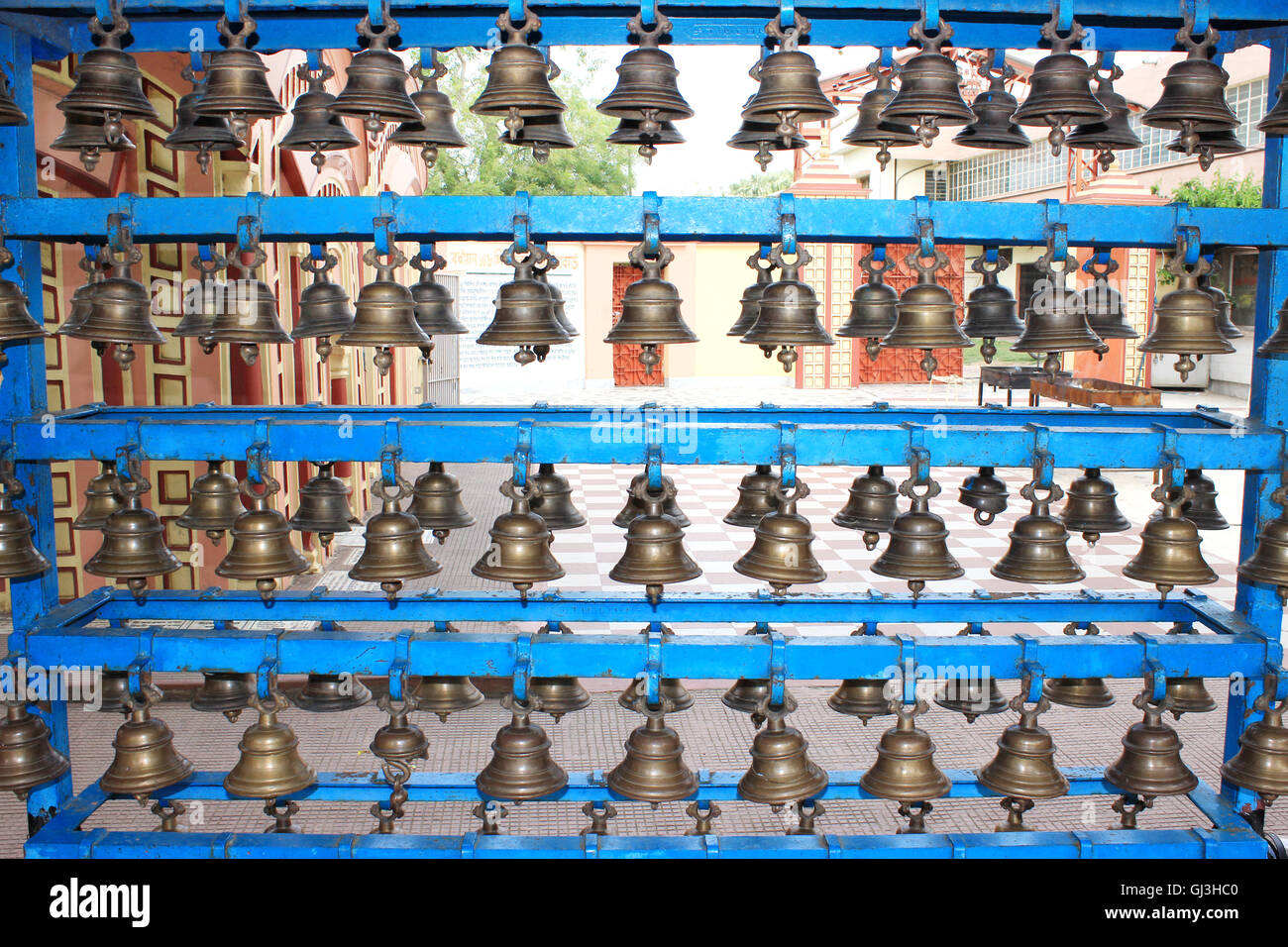Hindu temple bells. Bells of the old temple in India. Pattern of bells ...