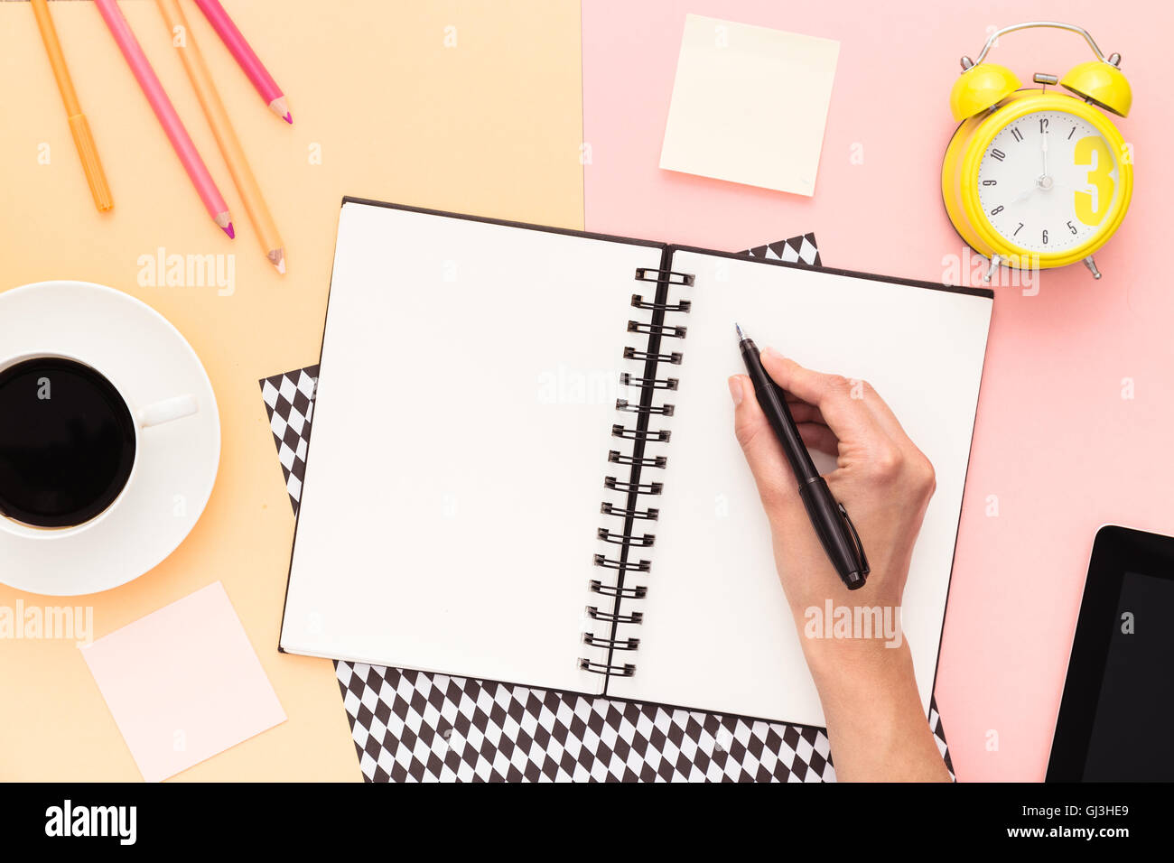 Young girl doing homework. Creative colorful desk with school, office ...