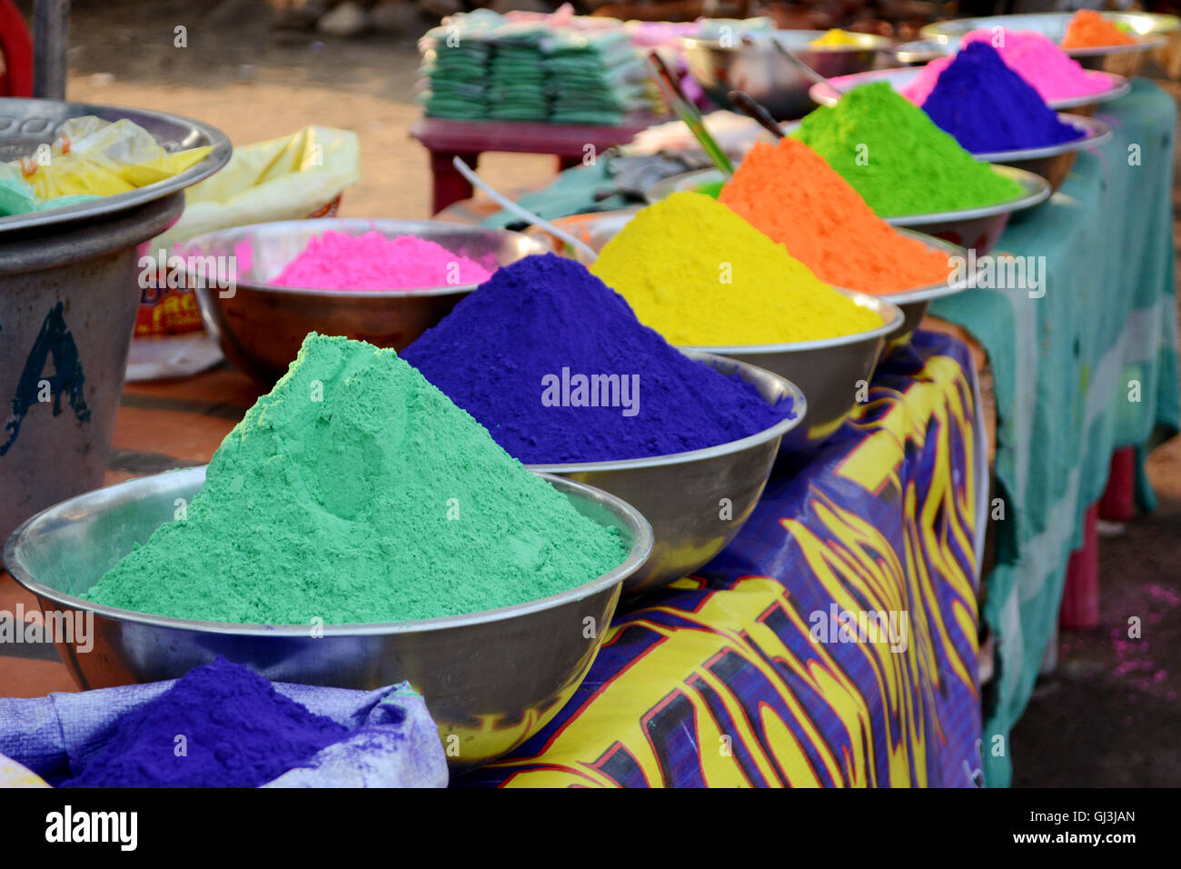 Color festival of India. Colorful powder in the market for selling ...