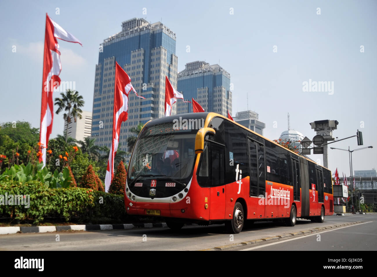 Transjakarta bus was passing in a special line Sudirman street, Jakarta ...