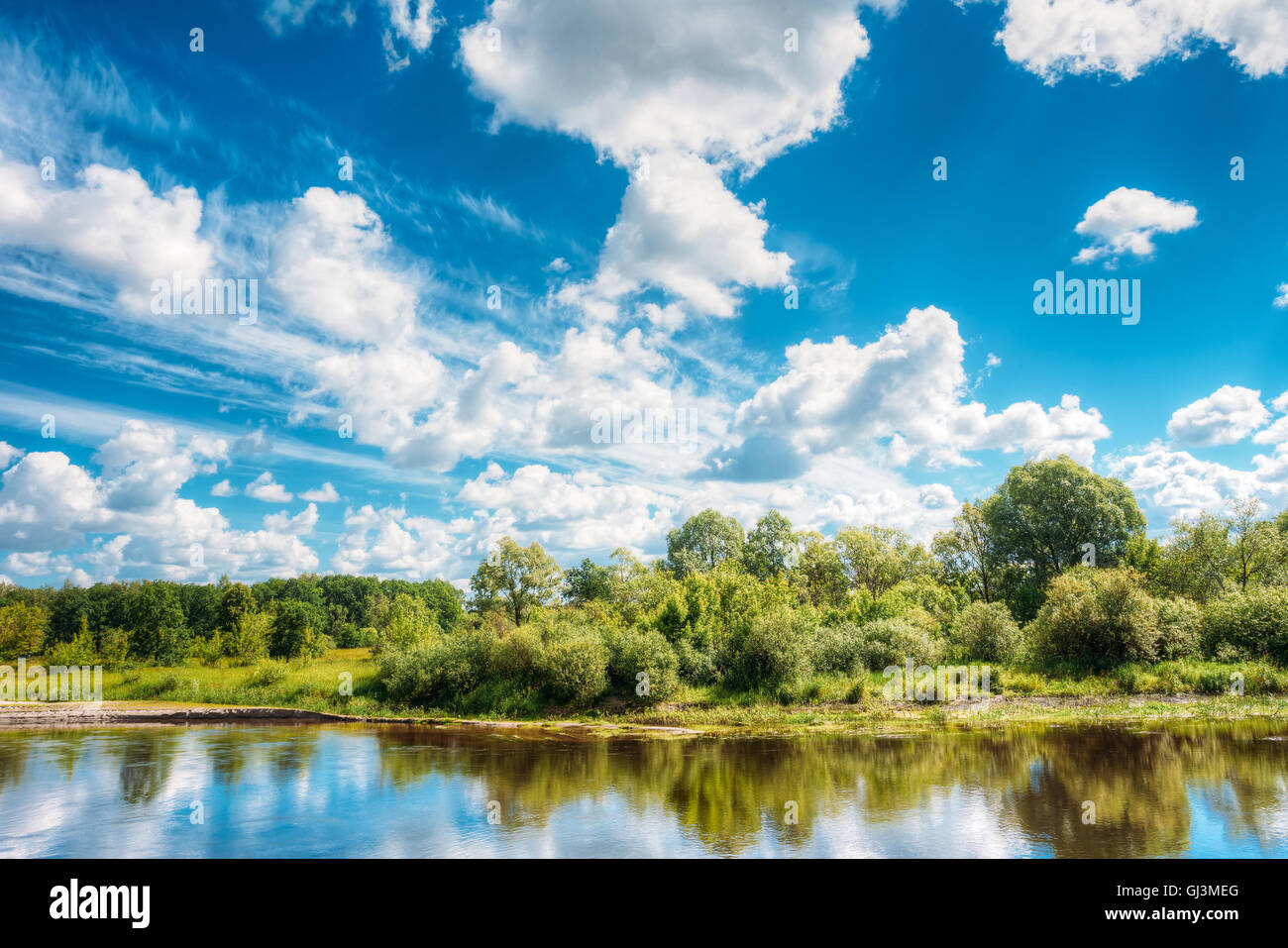 River Landscape With Reflections Of Clouds And Woods In Water. Summer ...