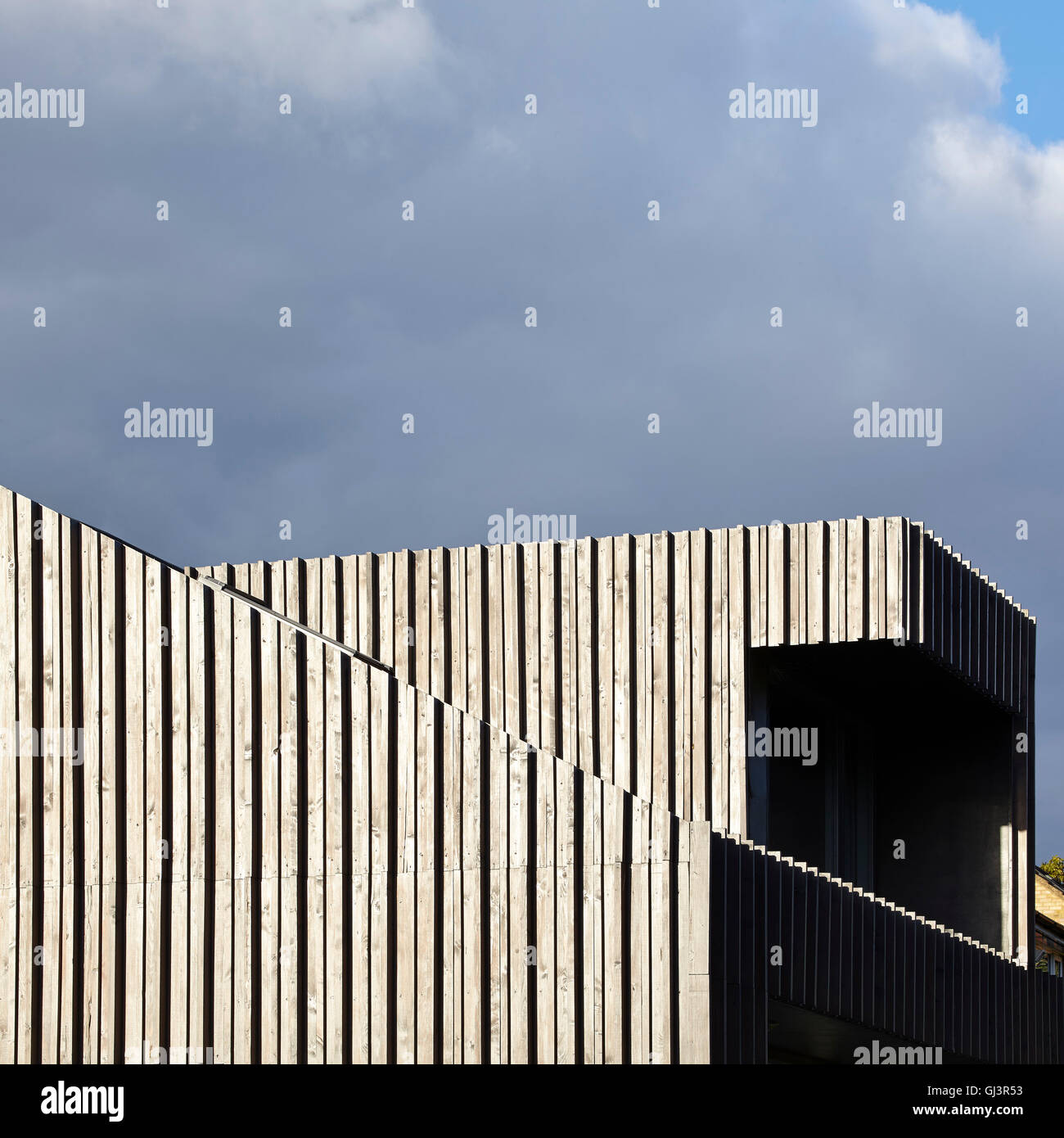 Abstract detail showing dark timber cladding. Paired House ...