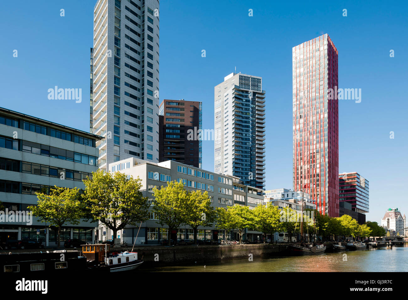 View of high-rise tower and adjacent towers and apartment blocks. The ...